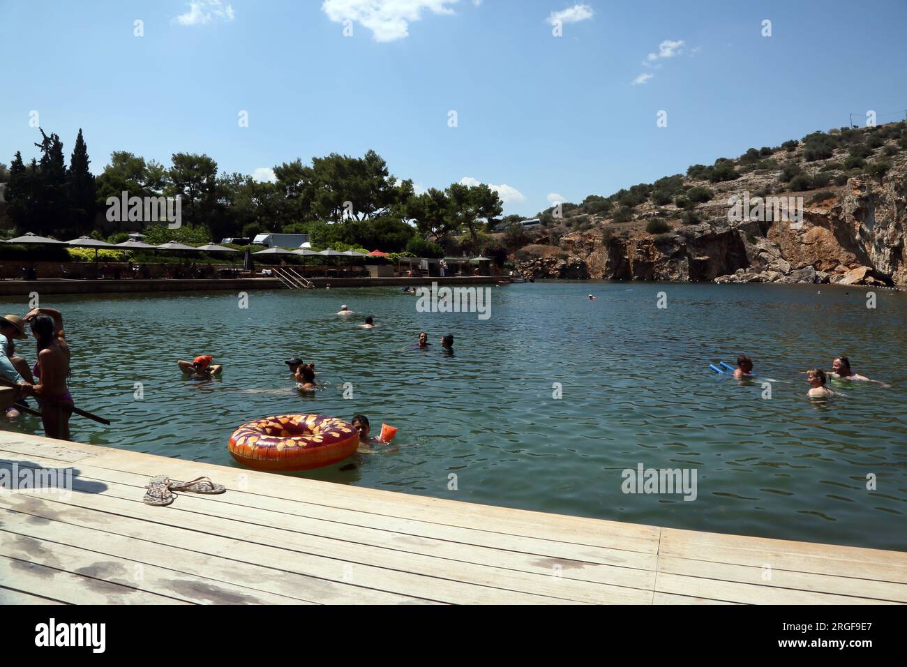 Vouliagmeni Athens Greece Tourists Swimming in Lake Vouliagmeni a ...
