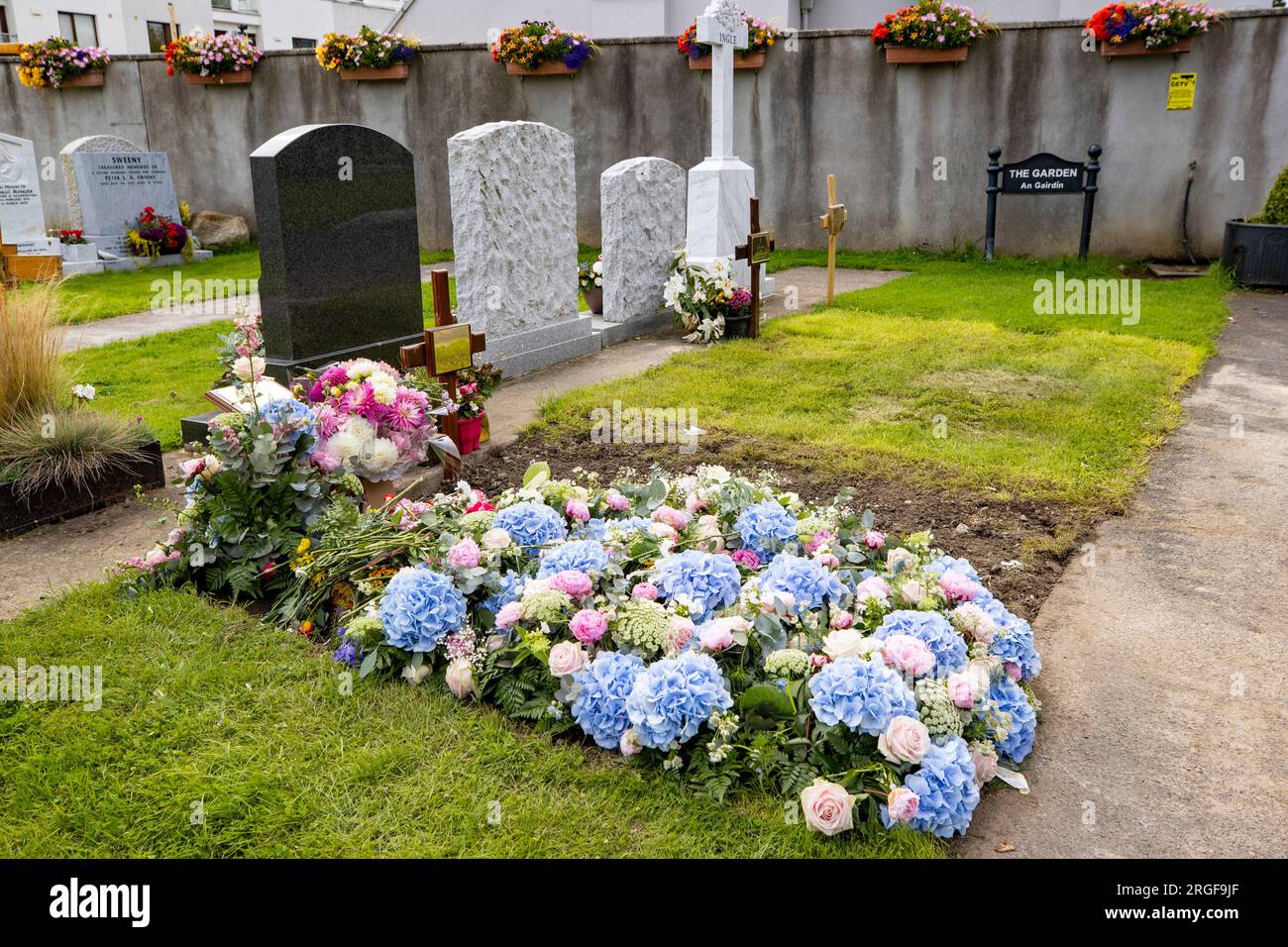 Flowers at the grave of Sinead O'Connor in The Garden section of ...