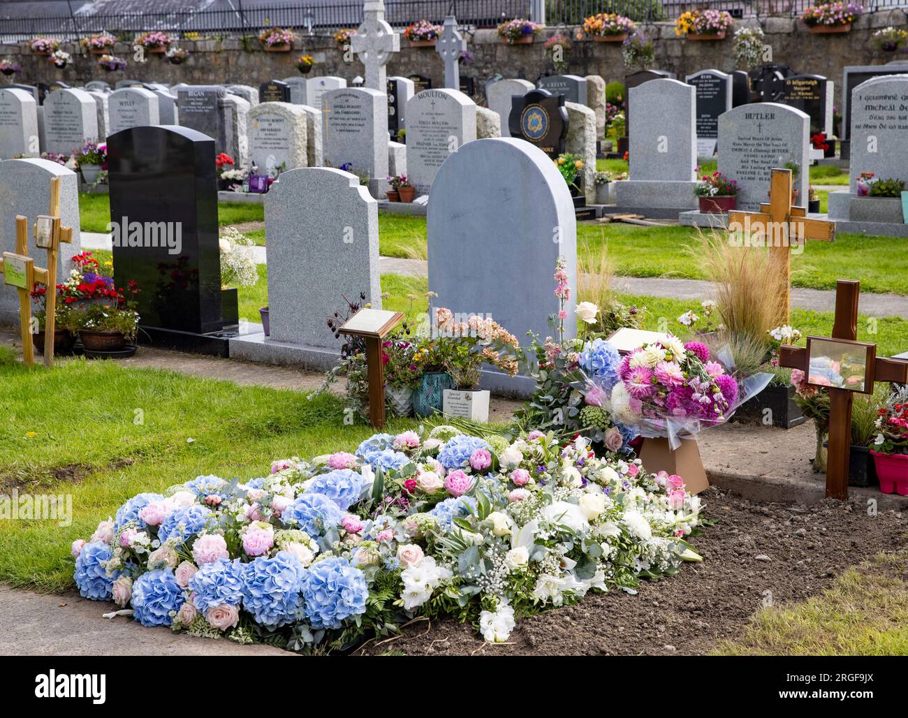 Flowers at the grave of Sinead O'Connor in The Garden section of ...