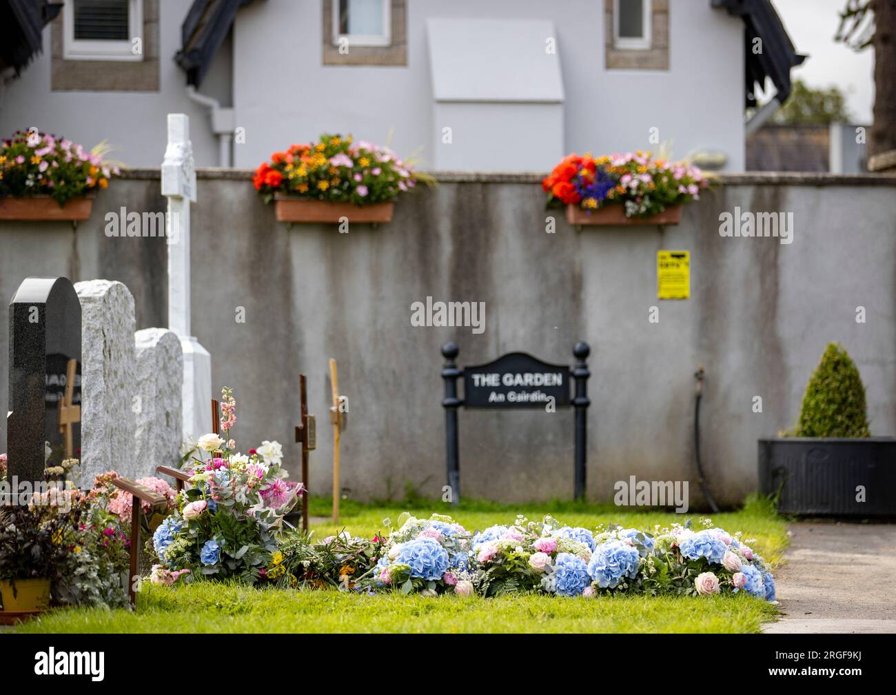 Flowers at the grave of Sinead O'Connor in The Garden section of ...