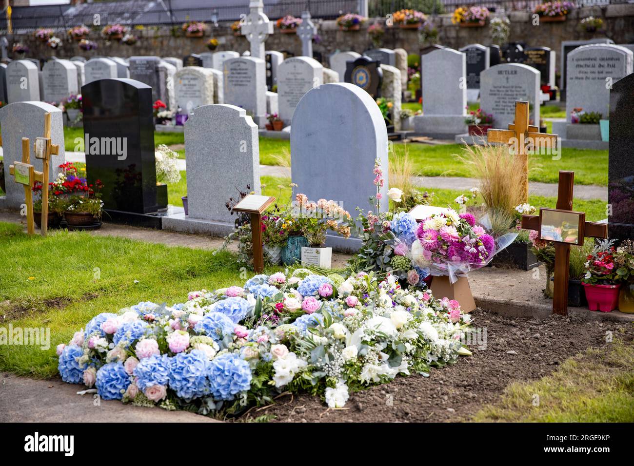 Flowers at the grave of Sinead O'Connor in The Garden section of ...