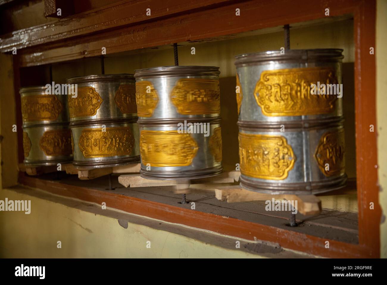 India, Ladakh, Zanskar, Sani, Monastery prayer wheels spinning in ...