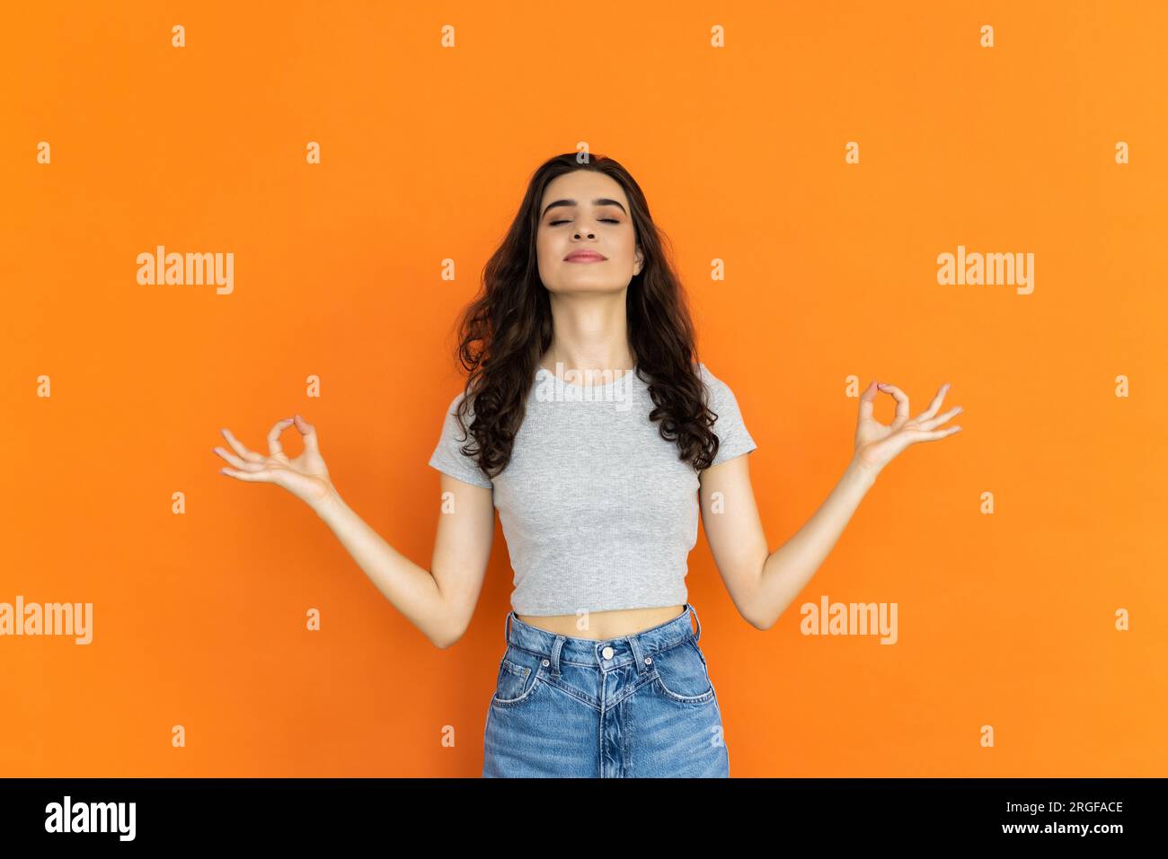 Relaxed female meditating on bright background, yoga techniques ...
