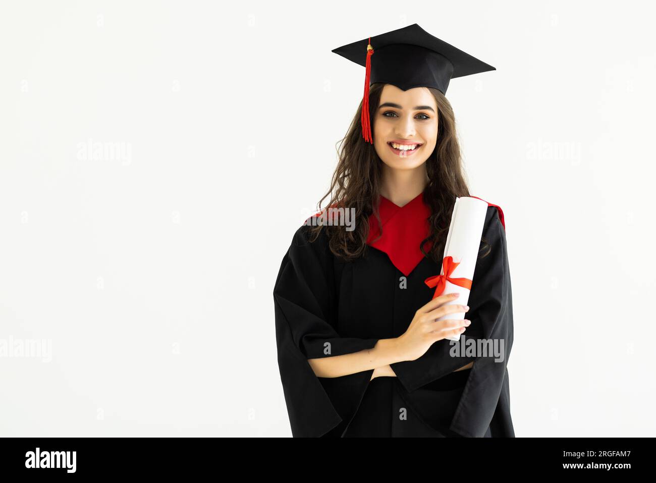 Female graduating student with diploma on light background Stock Photo ...