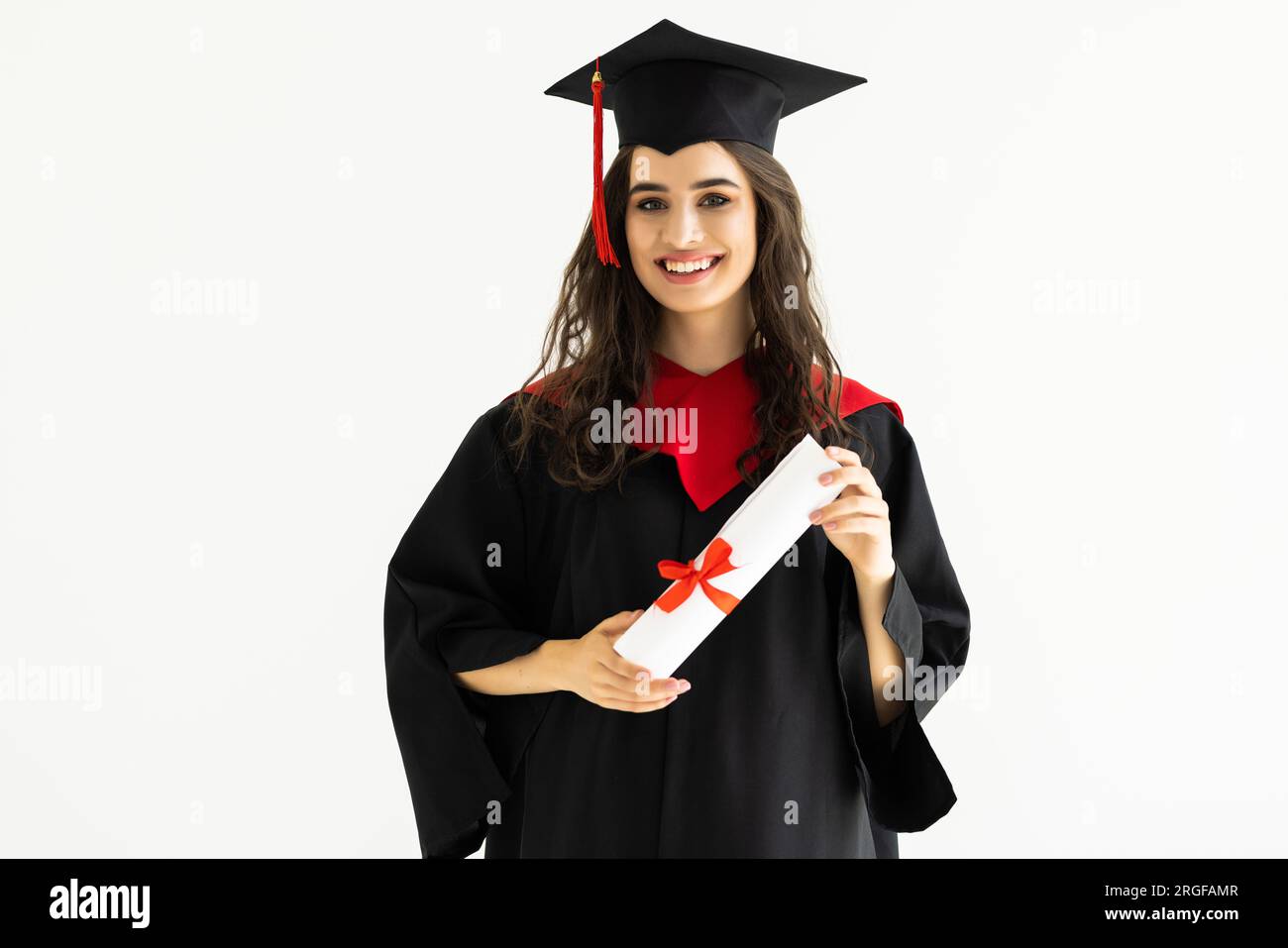 Female graduating student with diploma on light background Stock Photo ...