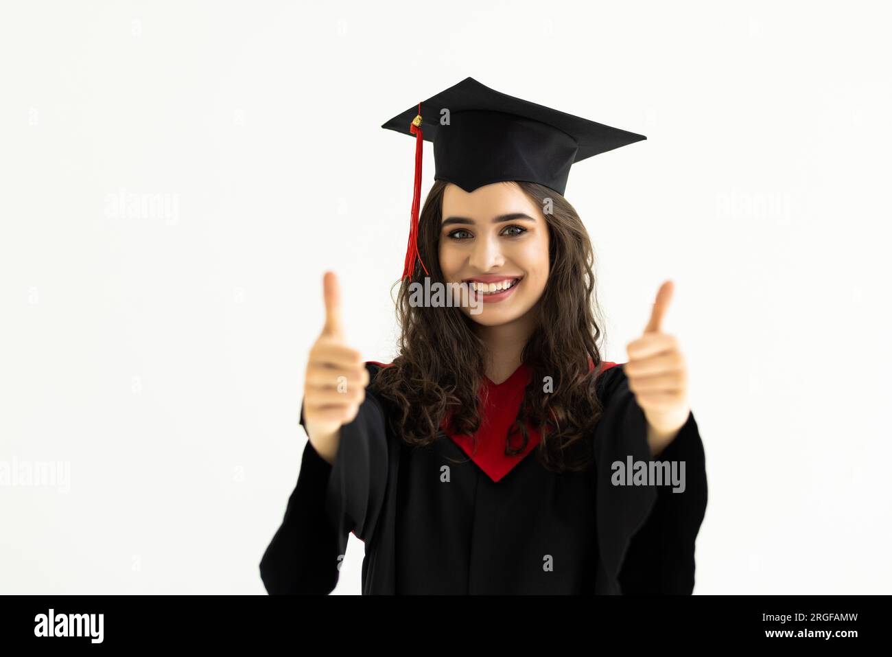 Graduation woman thumbs up isolated hi-res stock photography and images ...