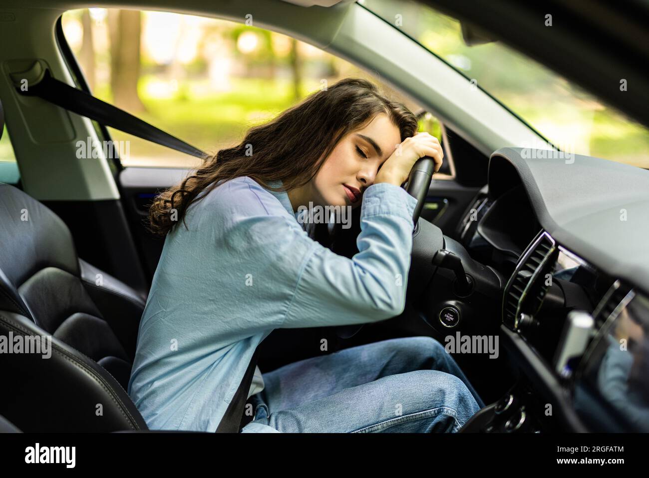 Stressed woman drive car feeling sad and angry. Driving when tired and ...