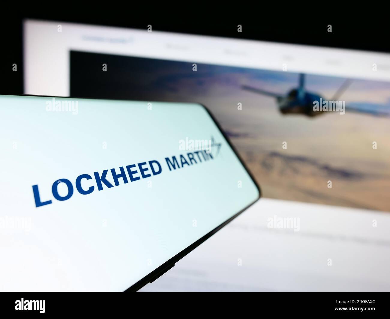 Cellphone with logo of American defense company Lockheed Martin ...