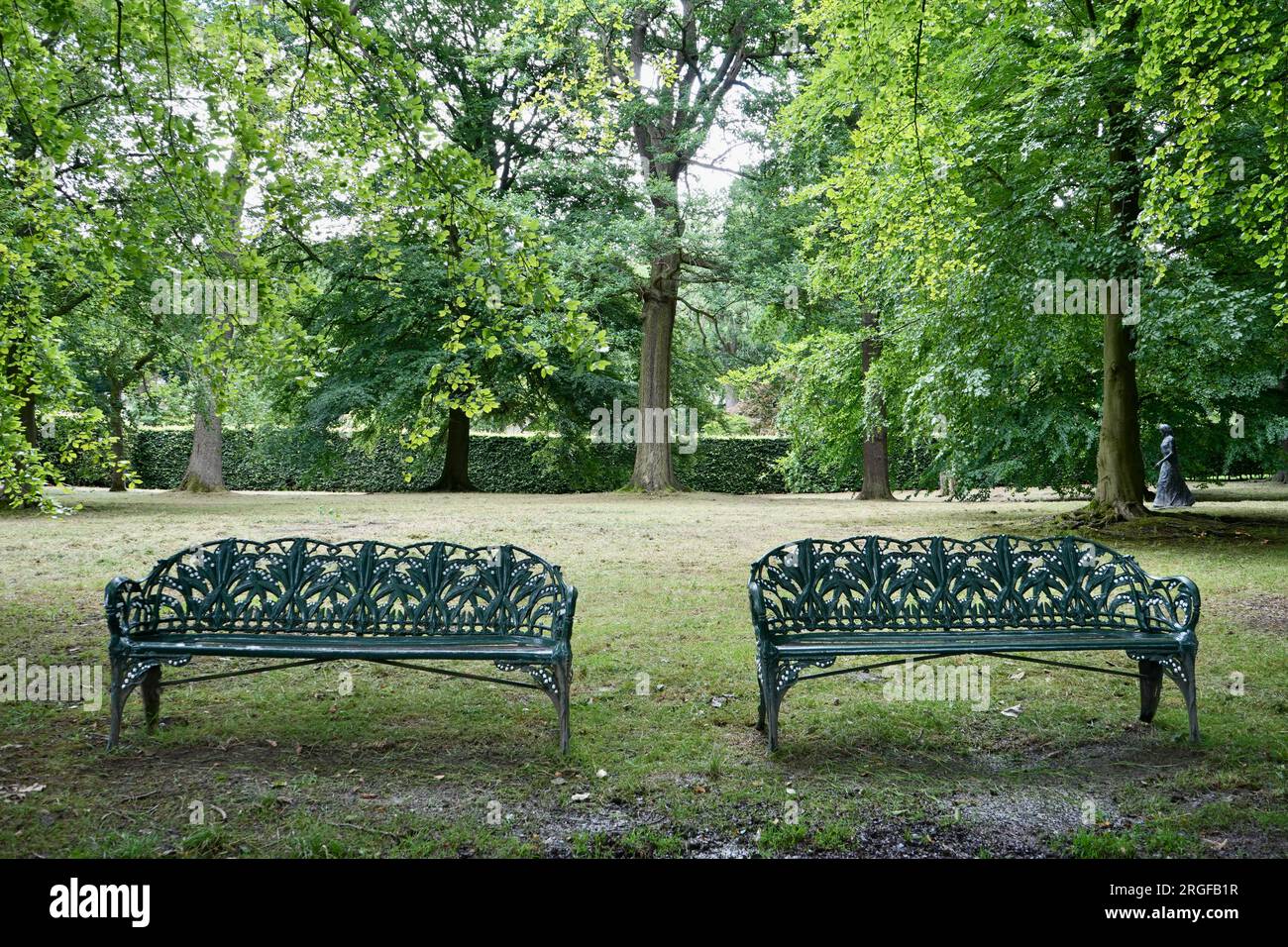 2 metal park benches in woodland, Derbyshire, UK Stock Photo - Alamy