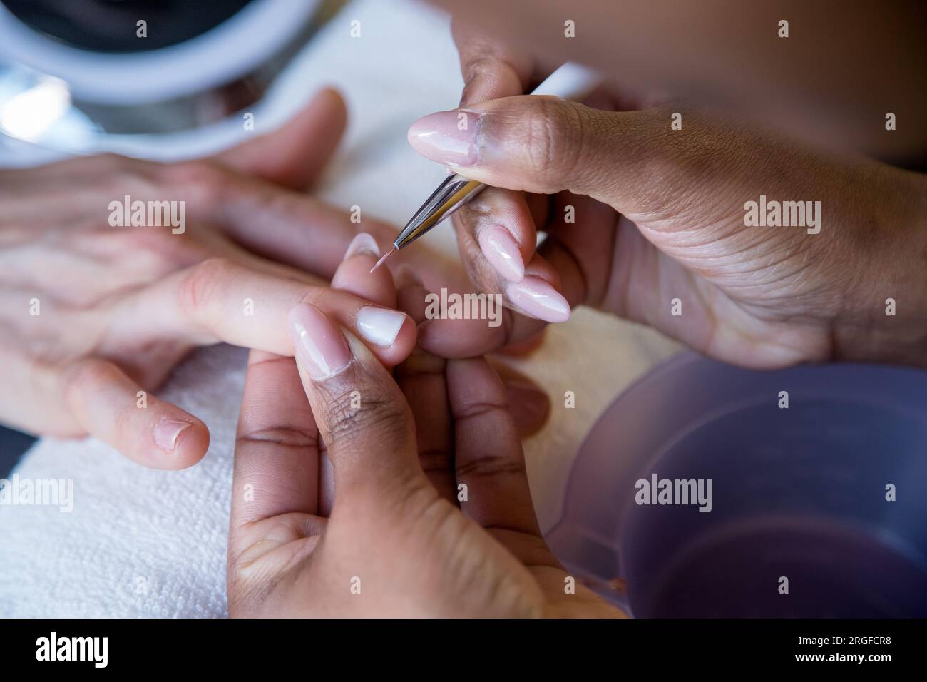 Nail painting process hi-res stock photography and images - Alamy