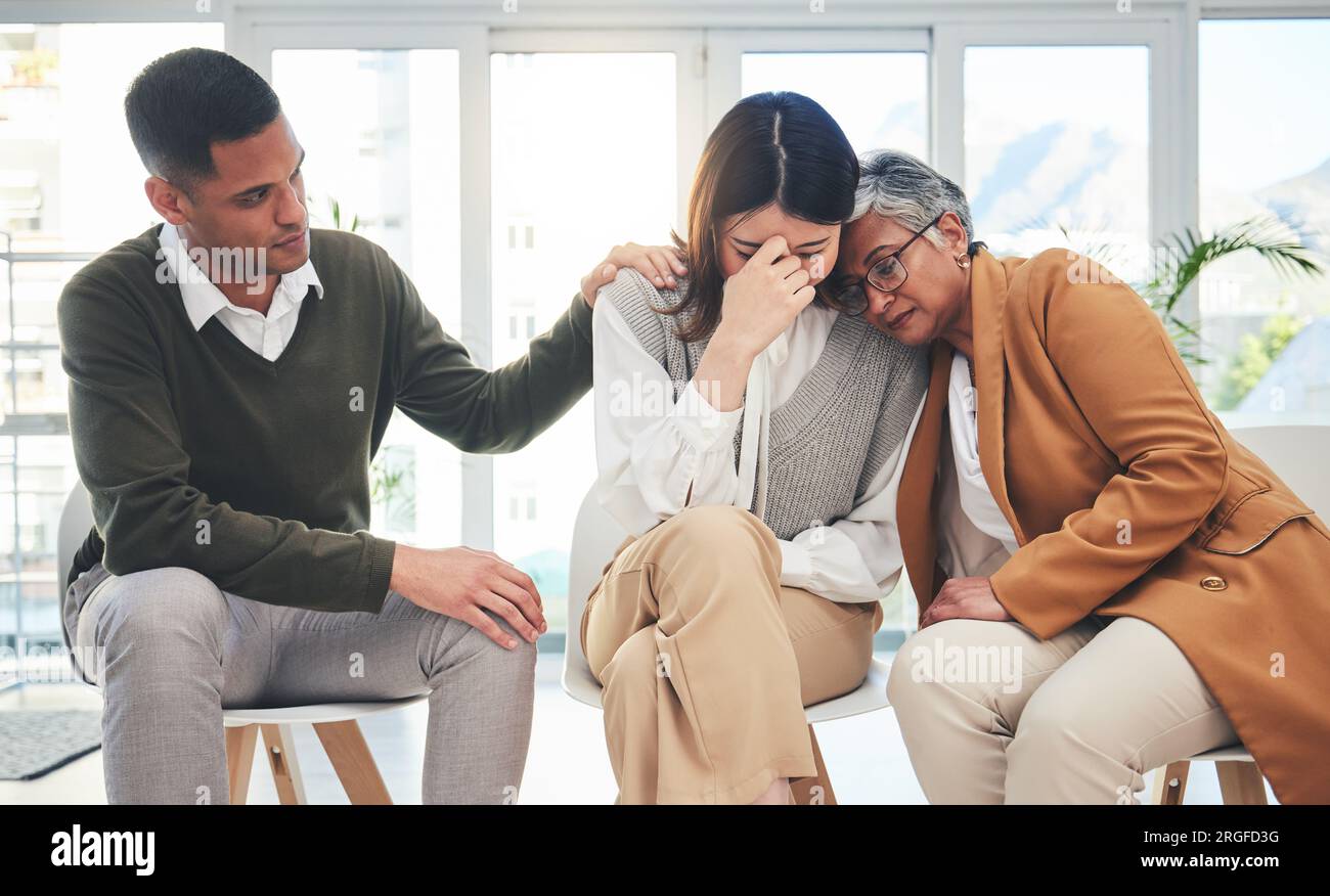 Support, group and psychologist comfort woman in depression, anxiety or trauma stress ...