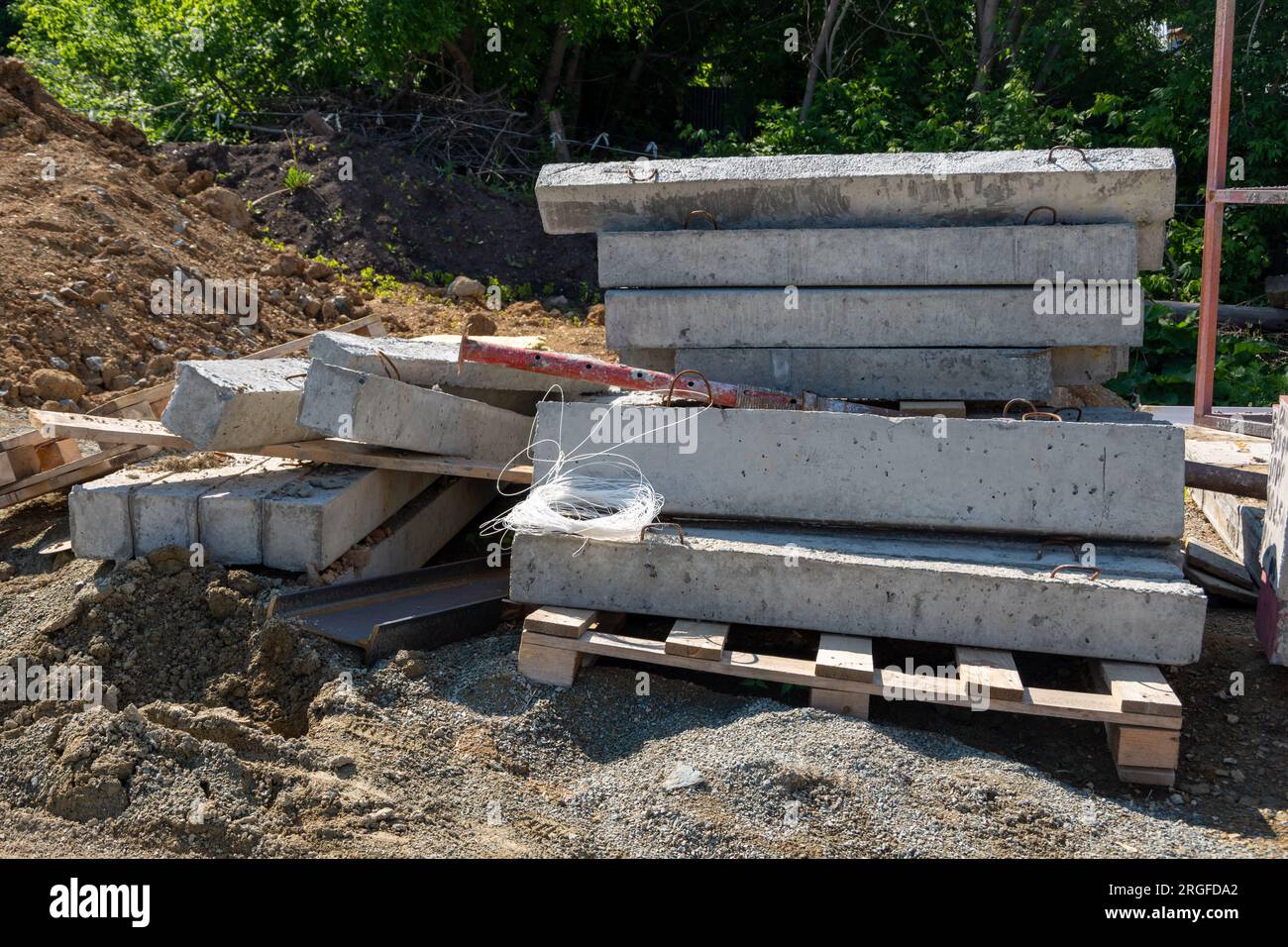 Concrete blocks for construction on wooden pallets. Storage cinder block. A construction site ...