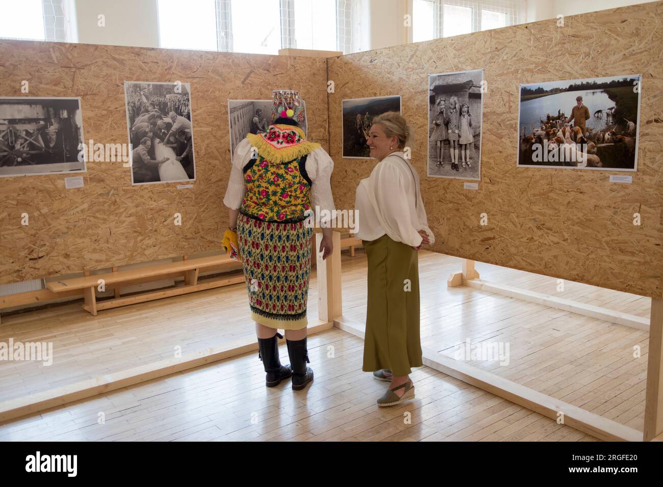 Sumiacky Fotofest, tourists festival goers, a woman in traditional ...