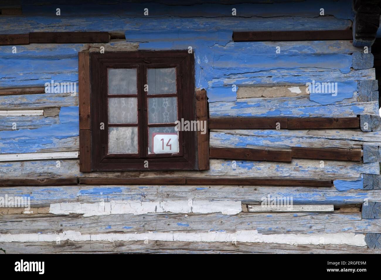 Wooden traditional home. A detail, painted blue and white traditional ...