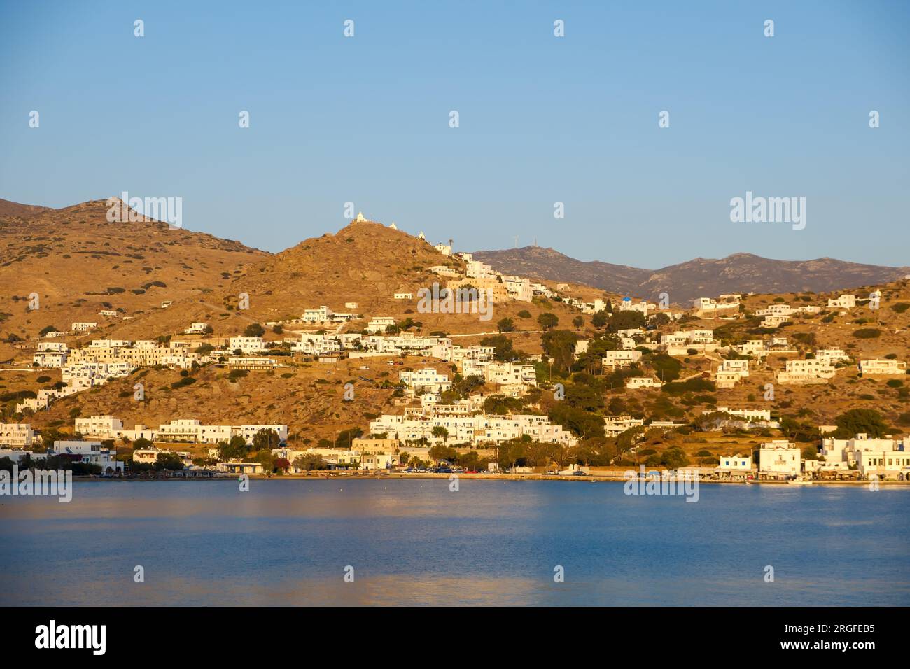 Panoramic view of the port of Ios Greece and the village up the hill ...