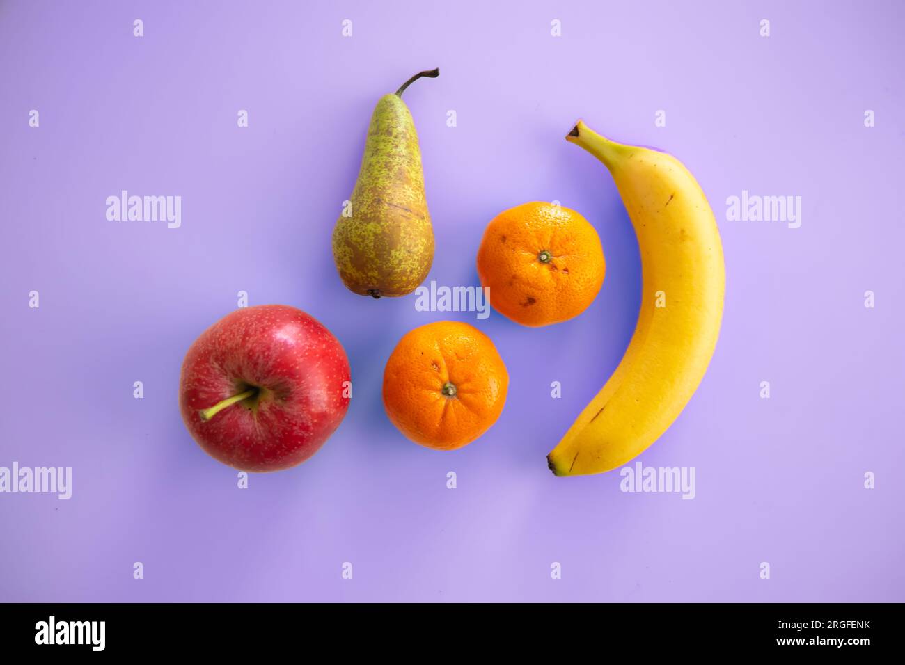 a top view of different fruits on colorful background Stock Photo - Alamy