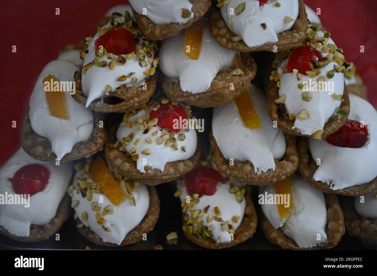 Cannoli the famous Sicilian pastries consisting of tube-shaped shells ...