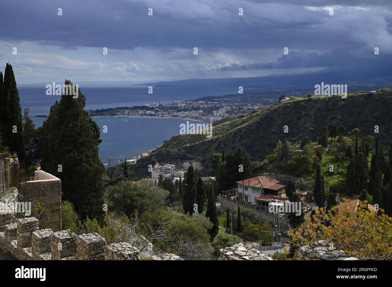 Landscape with scenic view of Giardini Naxos as seen from Taormina ...