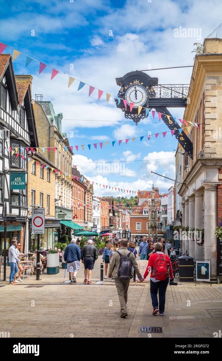 A view looking west down the High Street in historic Winchester ...