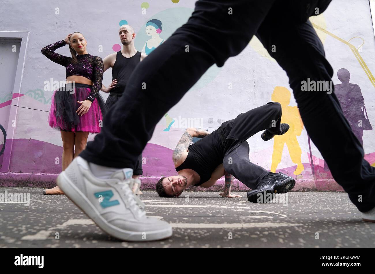 Ballet dancers Kealy Fouracre, Tyrone Anthony and street perfomer Riley ...