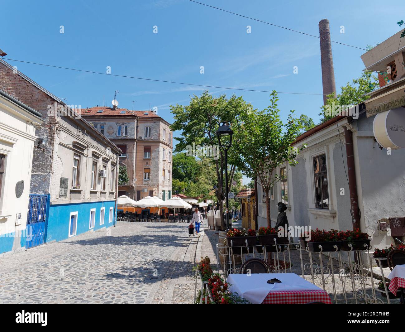 The famous bohemian cobbled Skadarlija street with cafes and ...