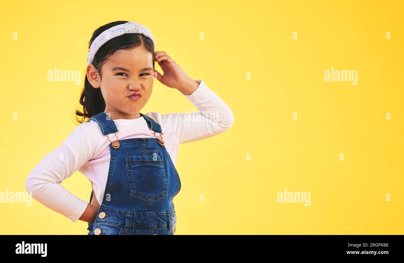 Confused, doubt and portrait of kid thinking in studio isolated on a ...
