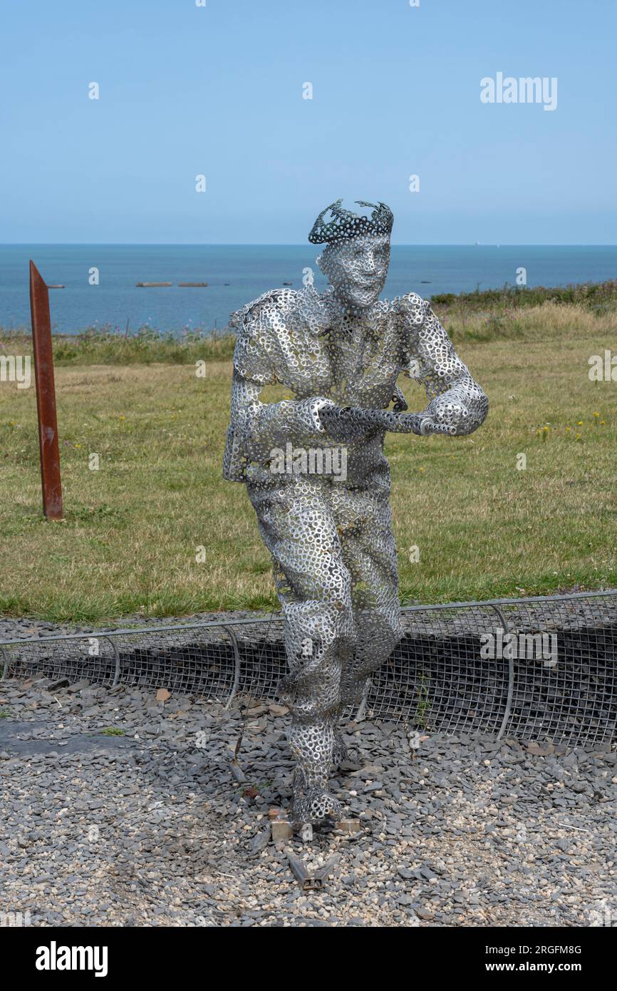 Arromanches-les-Bains, France - 07 21 2023: Statue of soldiers fighting ...