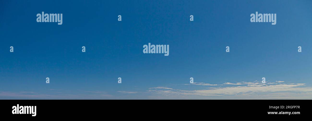 Image of a partly cloudy and partly clear sky during the day without ...