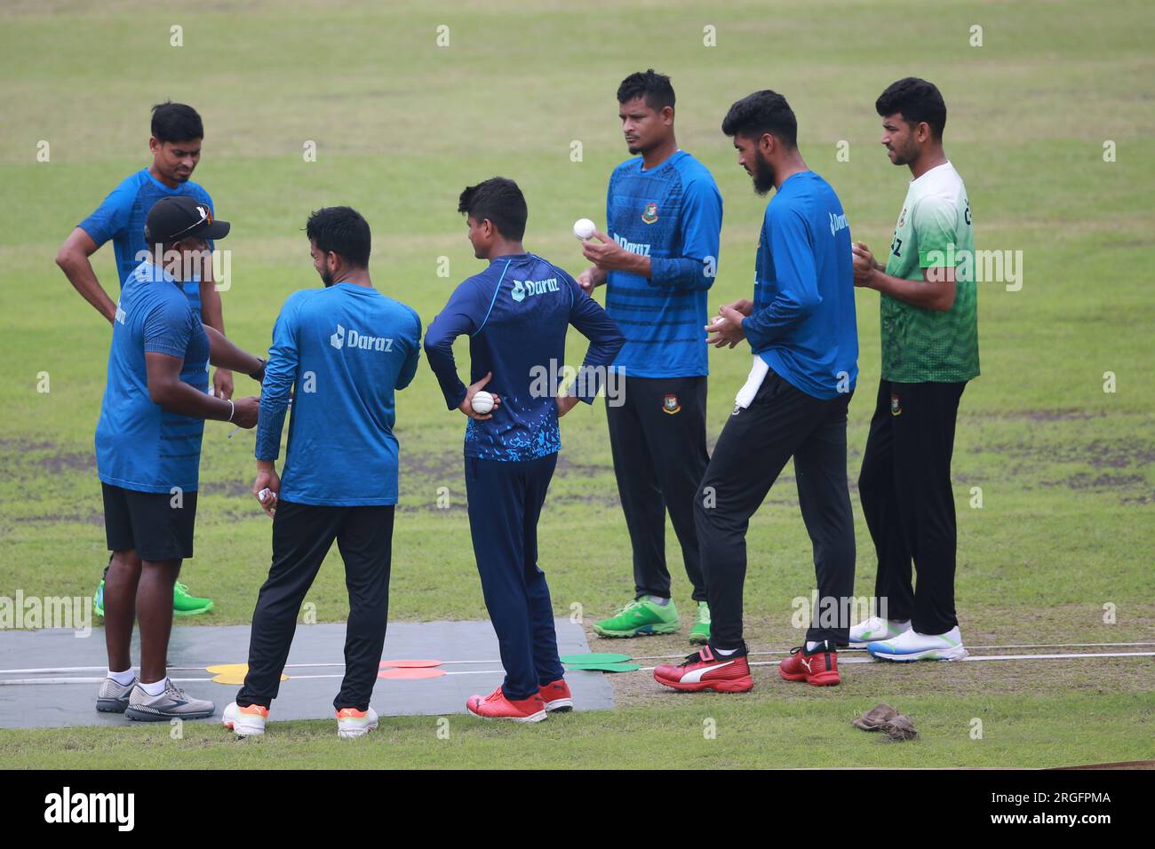 Spine bowling coach Rangana Herath along the spin bowler Mehidy Hasan ...