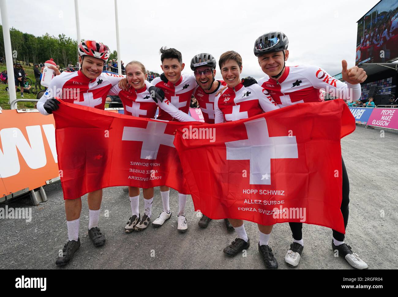 The Switzerland team celebrate victory in the Mixed Team Relay race ...