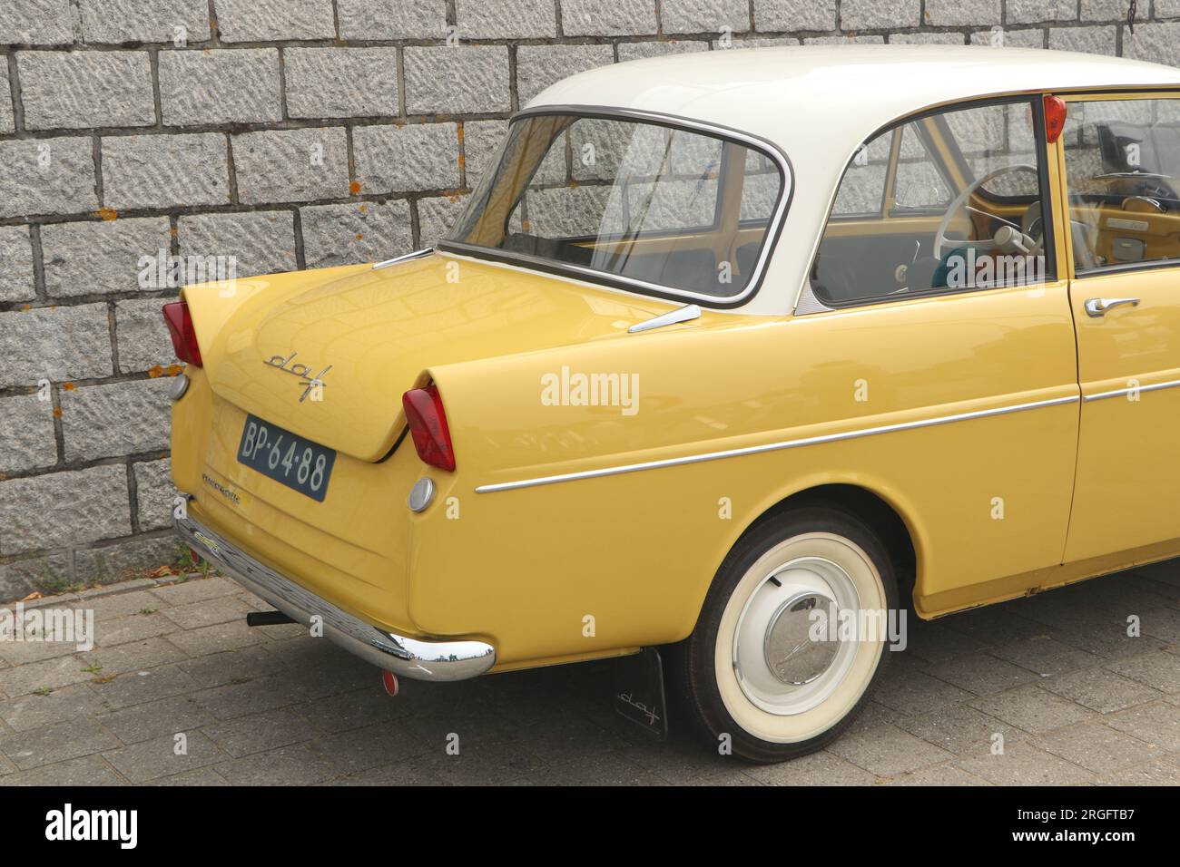 rear of classic yellow DAF 600 car on dutch oldtimer day in Lelystad ...