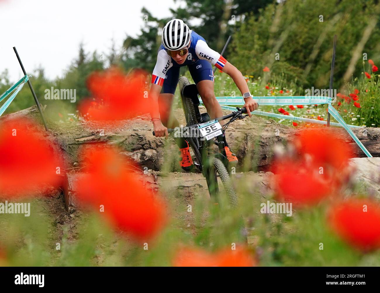 France's Anais Moulin competes in the Mixed Team Relay race during day ...