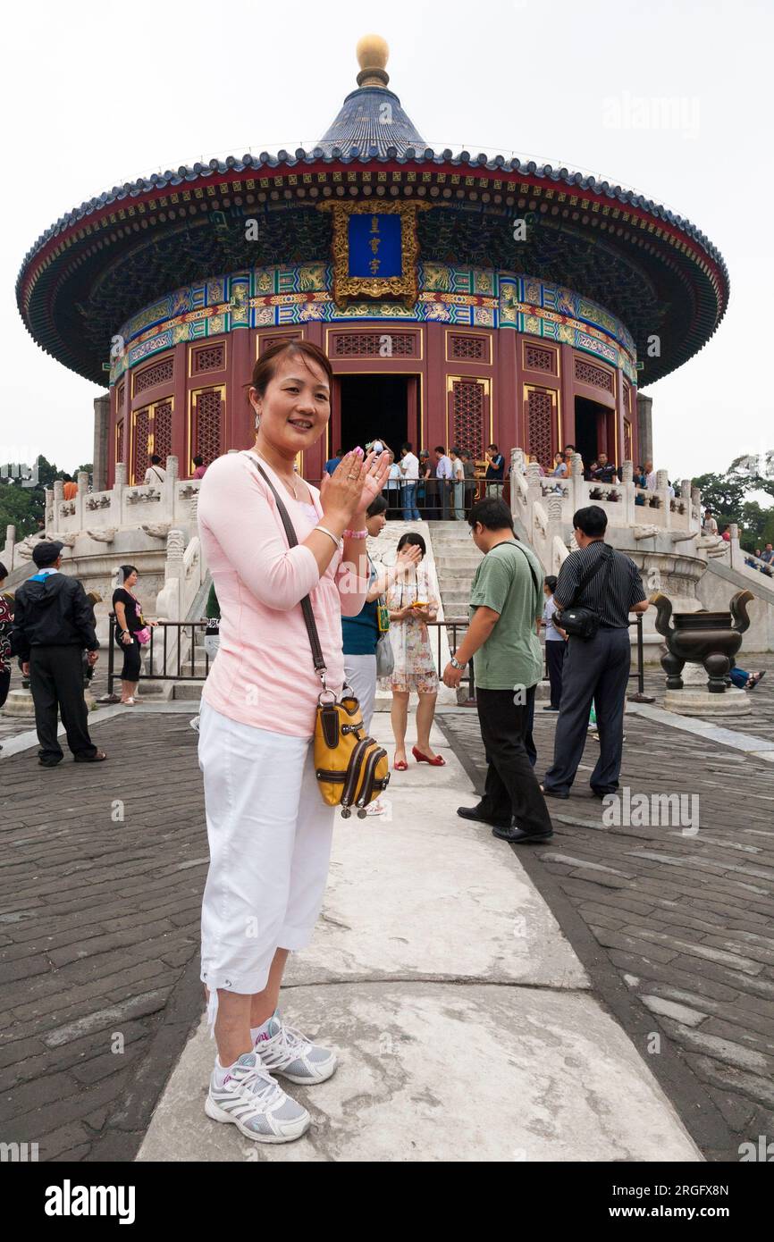 Chinese woman visitor in front of the exterior / outside of the ...