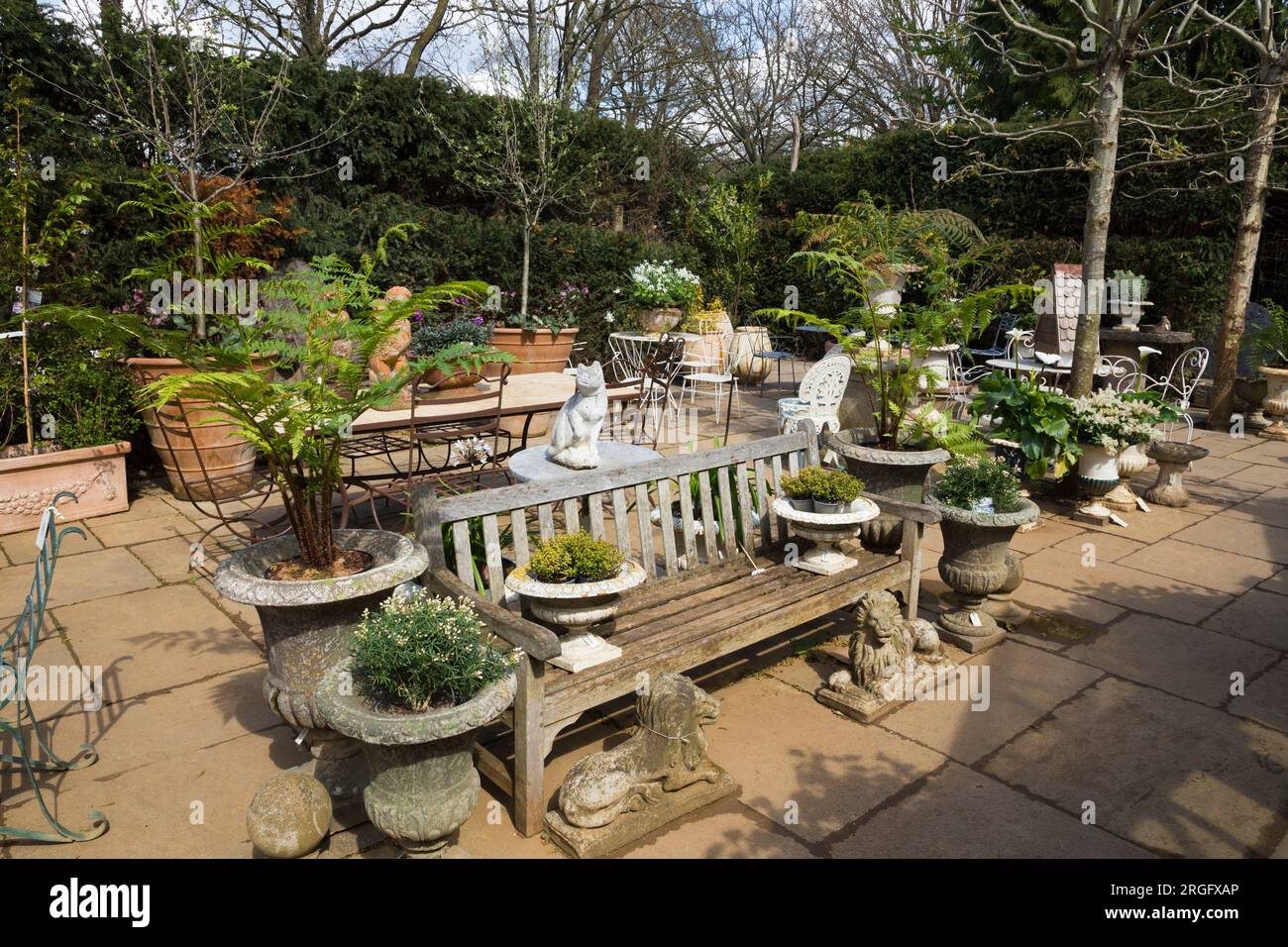 Display including flower pots, furniture, seat, bench, garden ornament ...