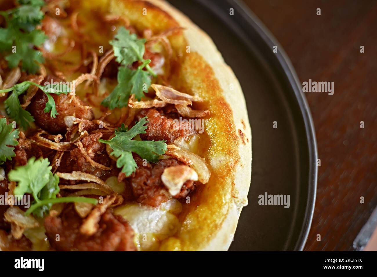 Grilled Chicken Pizza with Red Onion and Cilantro Stock Photo - Alamy
