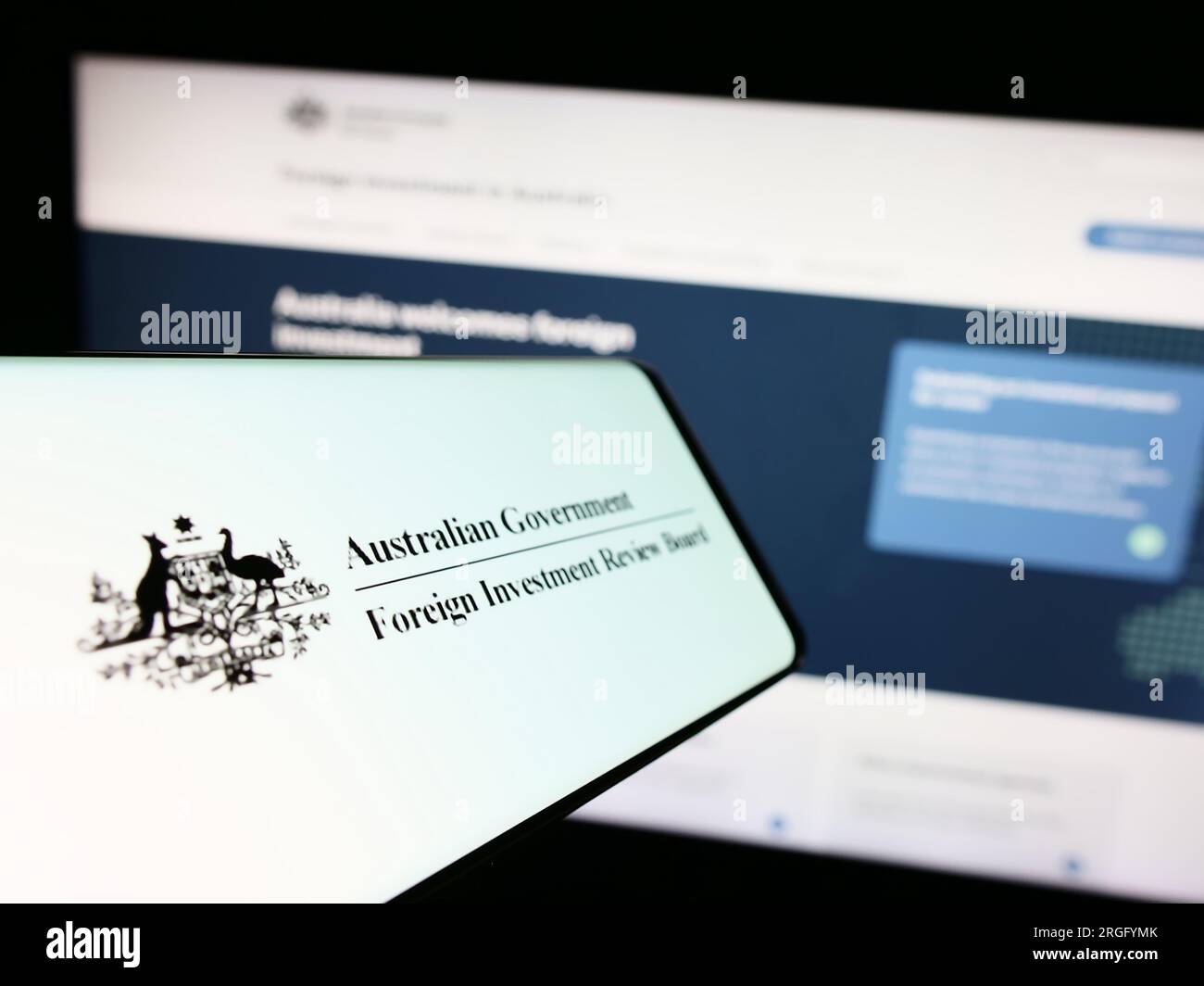 Smartphone with logo of Australian Foreign Investment Review Board ...