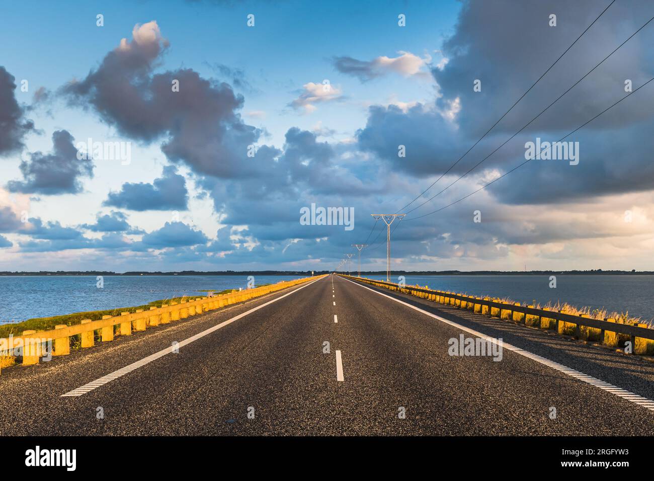 Street on the dam to the North Sea island of Romo in the Danish part of ...