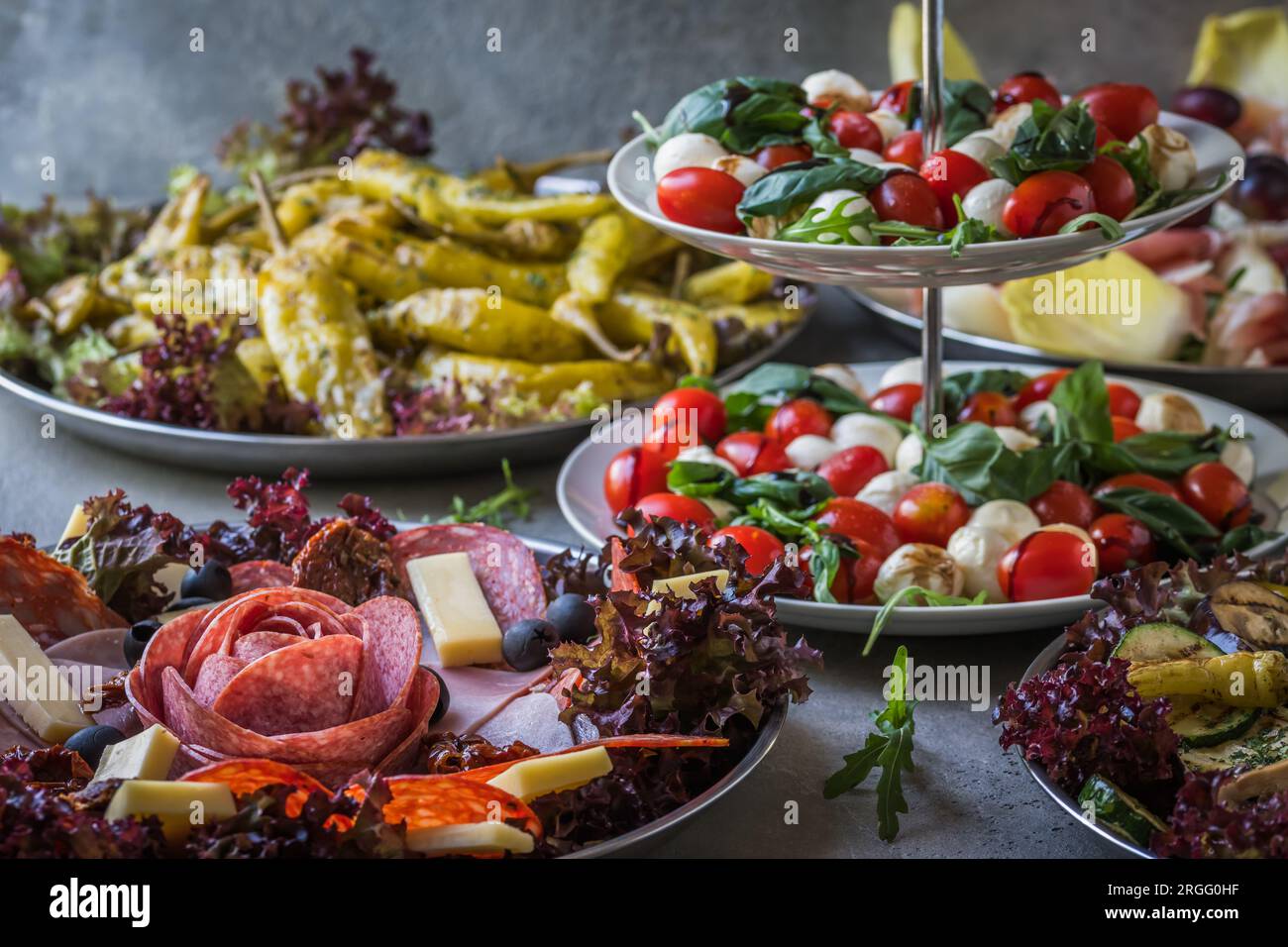 Italian appetizer buffet with grilled vegetables, grilled pepperoni ...