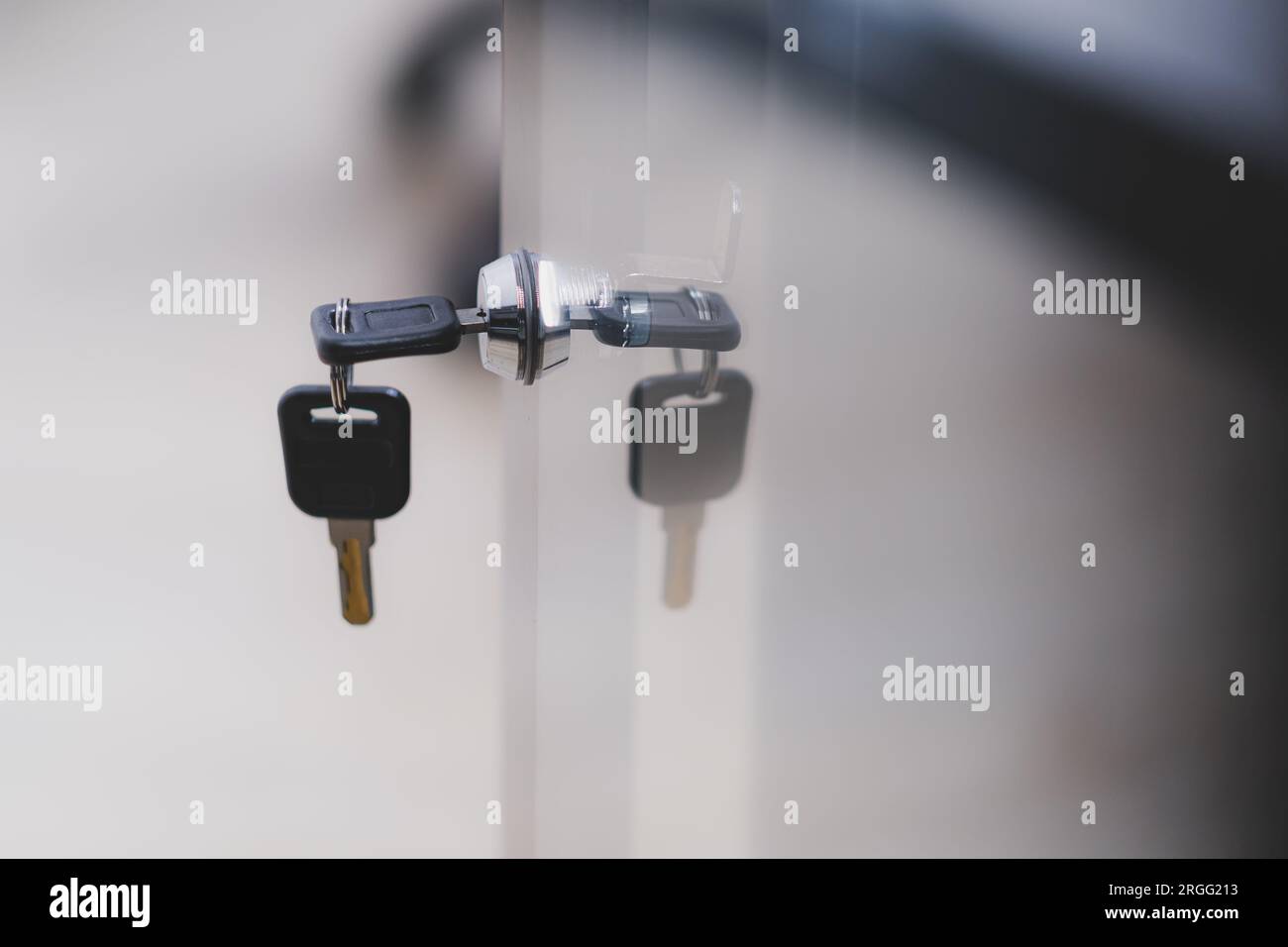 cabinet Door key for lock Stock Photo - Alamy