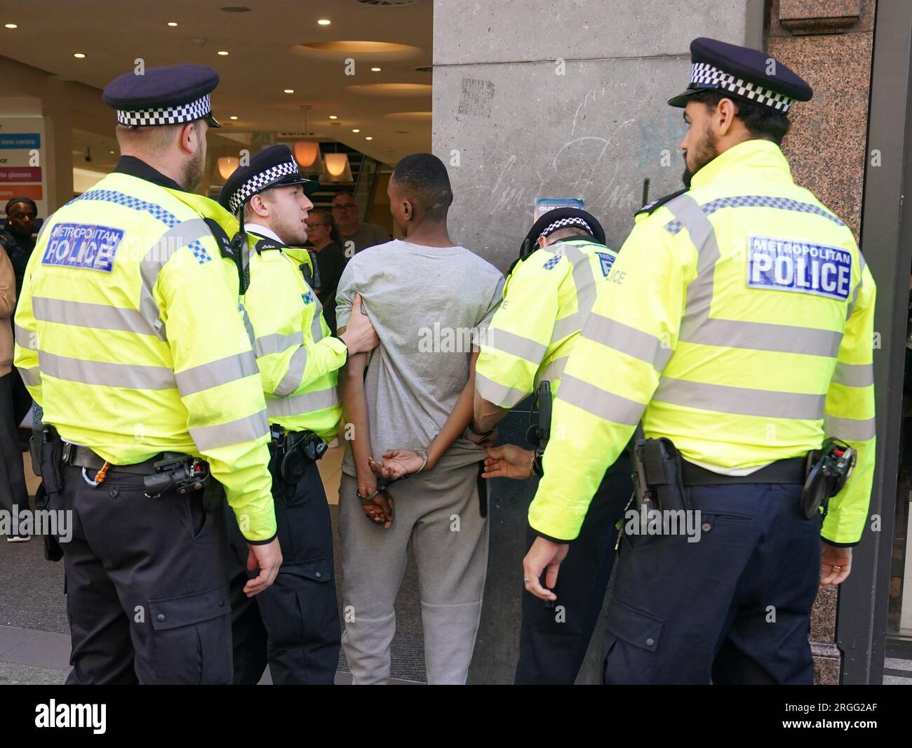A person is detained outside McDonald's on Oxford Street, central ...