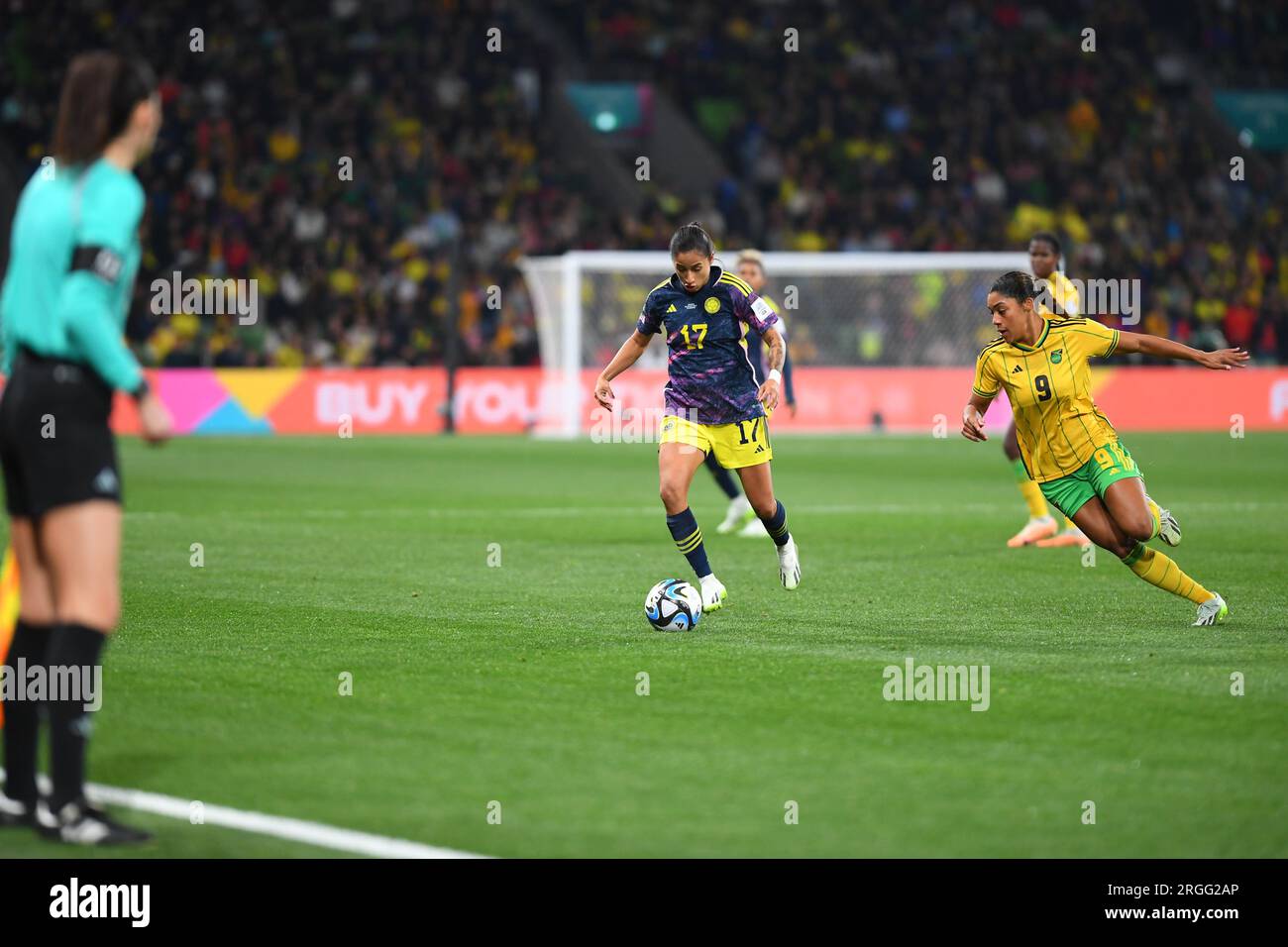 Carolina Arias (L) of Colombia and Kameron Simmonds (R) of Jamaica are ...