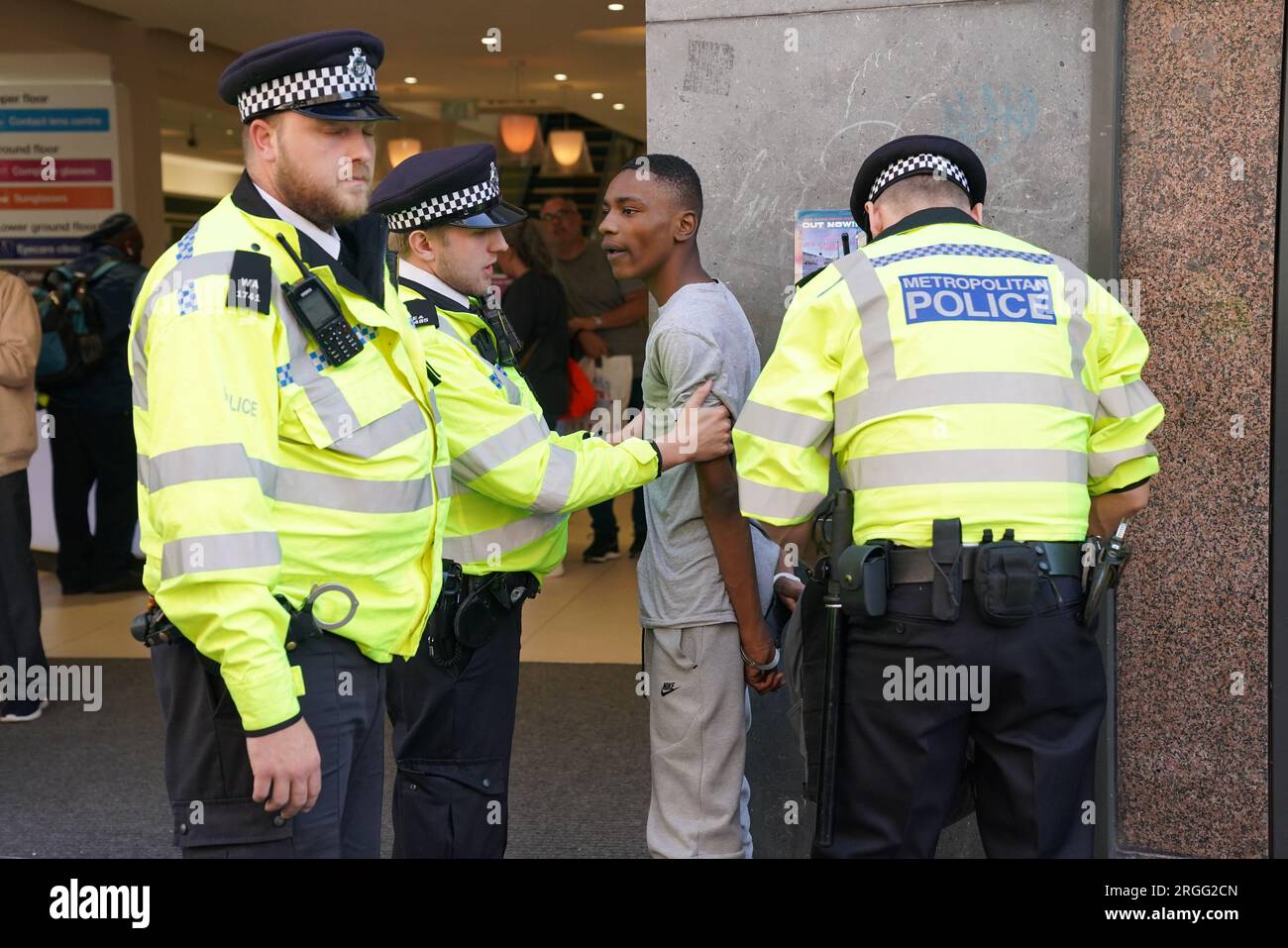 A person is detained outside McDonald's on Oxford Street, central ...