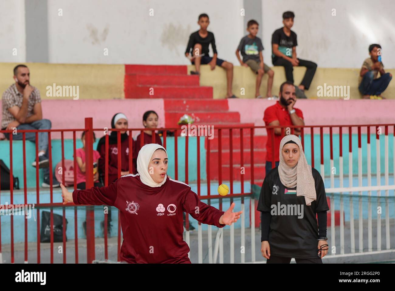 A Palestinian female Baseball player Samar Said throws the ball as she ...