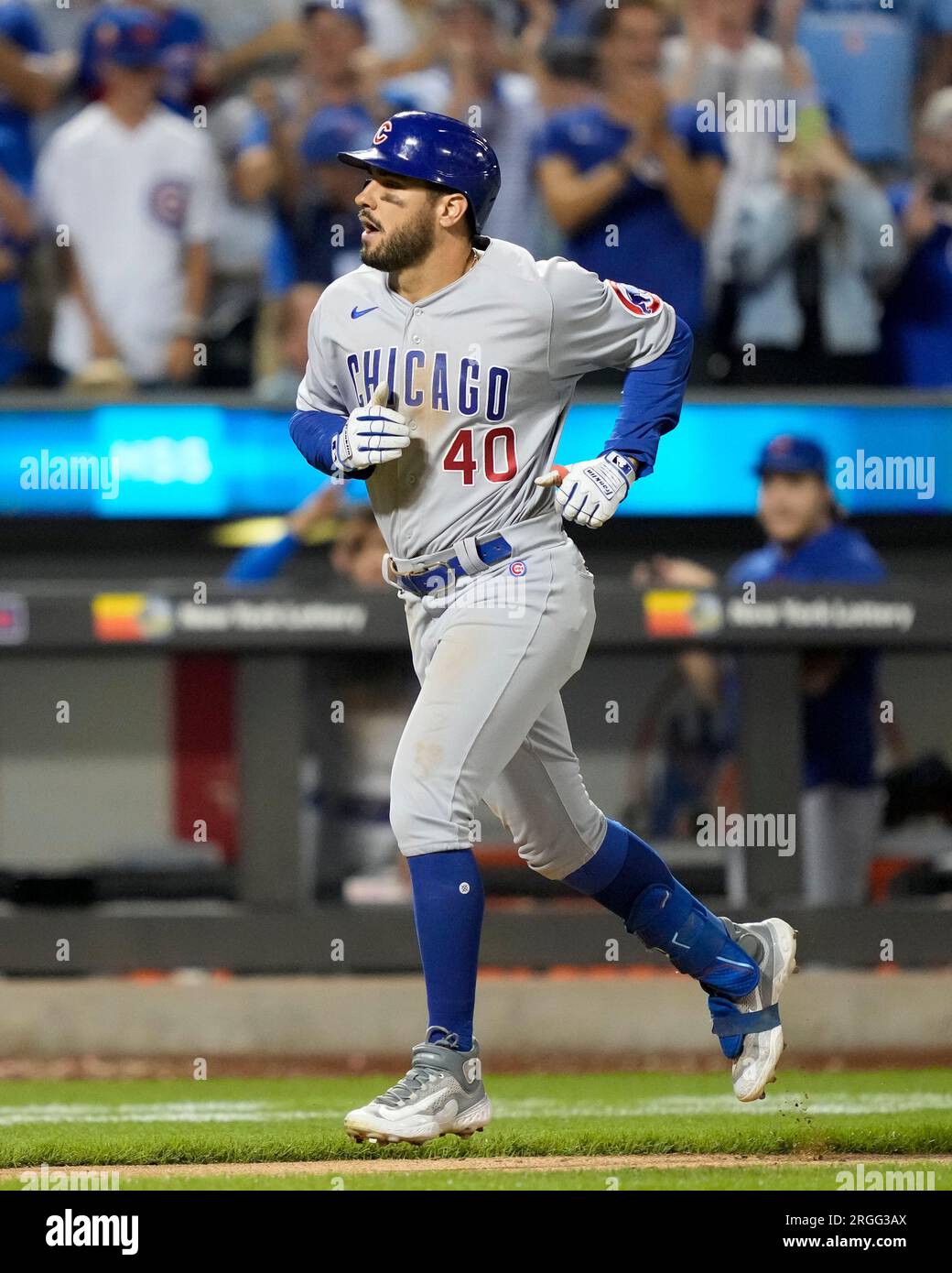 Chicago Cubs' Mike Tauchman runs the bases after hitting a solo home ...