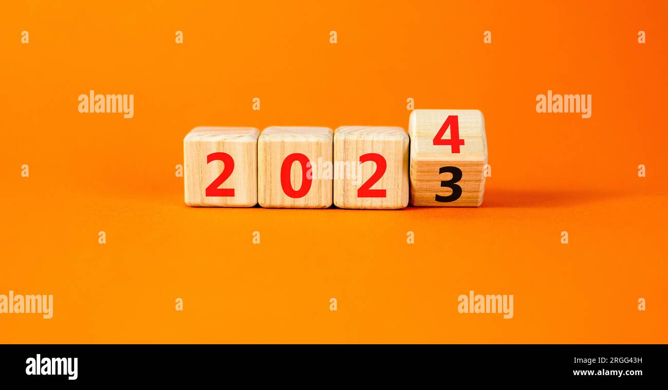 2024 happy new year symbol. Wooden cubes with number 2023 and 2024 ...