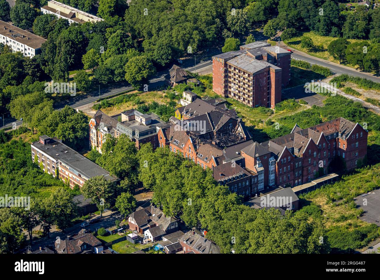 Aerial view, Former St. Barbara Hospital with fire damage to roof truss ...