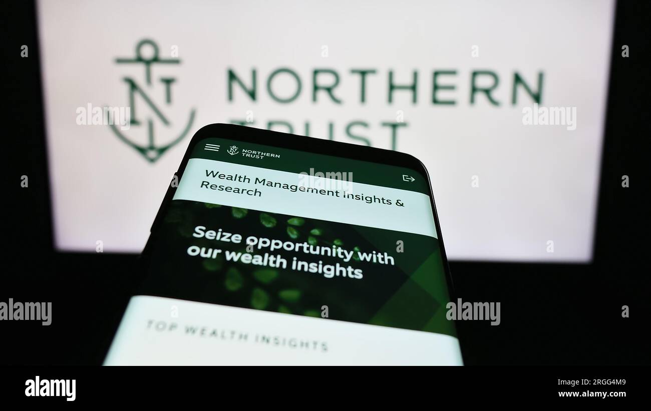 Mobile phone with website of US financial company Northern Trust ...