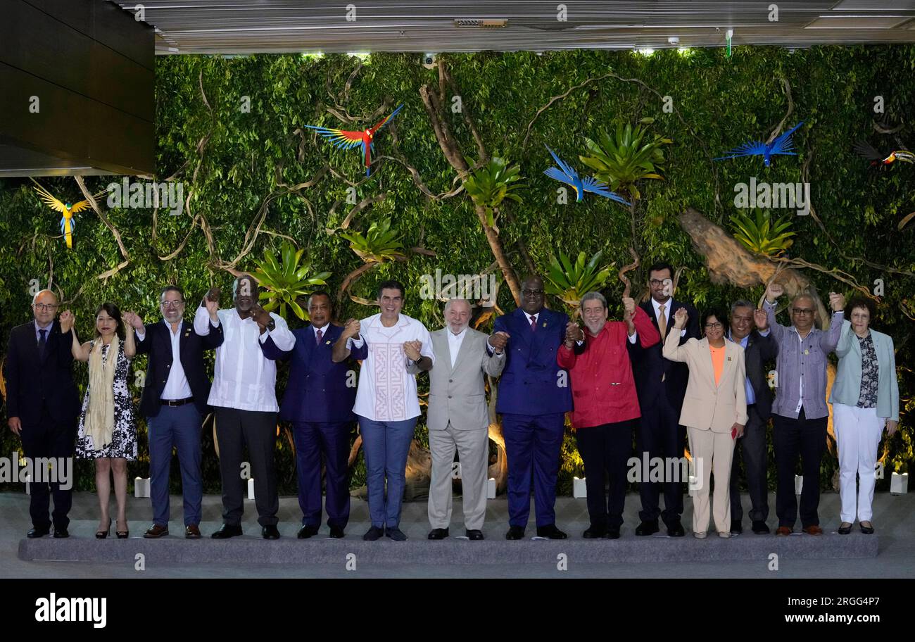 Leaders pose for a group photo during the Amazon Summit at the Hangar ...