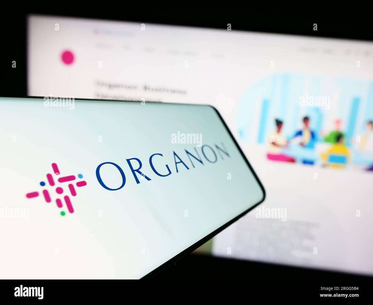 Mobile phone with logo of American pharmaceutical company Organon Co ...