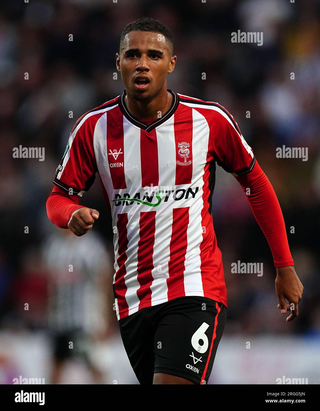 Lincoln City's Ethan Erhahon during the Carabao Cup first round match ...